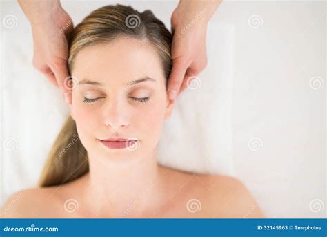 Attractive Woman Receiving Head Massage At Health Spa Stock Image