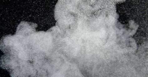 Particles Of Dust Flour Debris Flying On Black Background Red