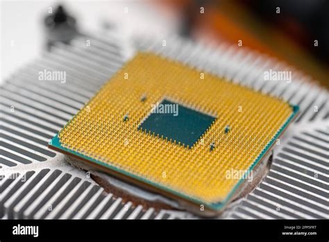 Back Of A AMD Socket AM CPU Mounted On A Cooler Stock Photo Alamy