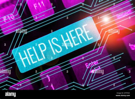 Sign Displaying Help Is Here Word Written On The Action Of Helping