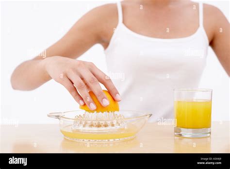 Squeezing juices hi-res stock photography and images - Alamy