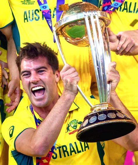 Australian Captain Pat Cummins Holds The Trophy After Winning The Icc