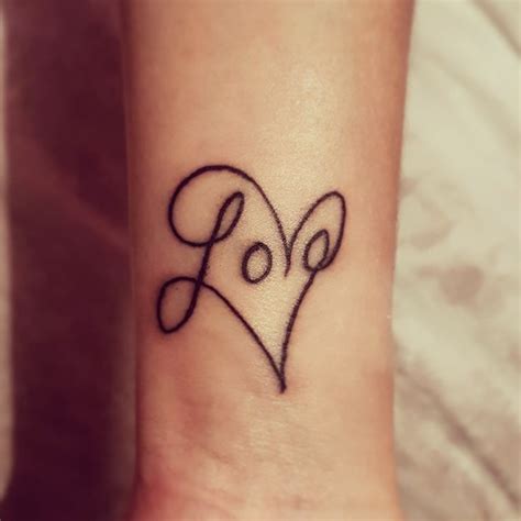 Small Love Tattoo On The Wrist Small Love Tattoos Love Tattoos