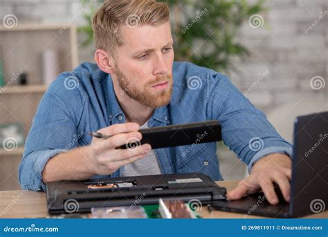 Thoughtful It Developer Thinking About Fixing Software Bugs Stock Image