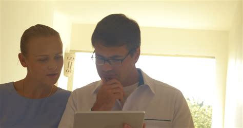 Business People With Tablet Pc Walking Along The Passage 29168737 Stock