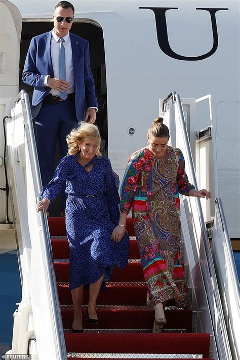 Naomi Biden Helps Hold Down Jills Dress Upon Windy Arrival In Kenya