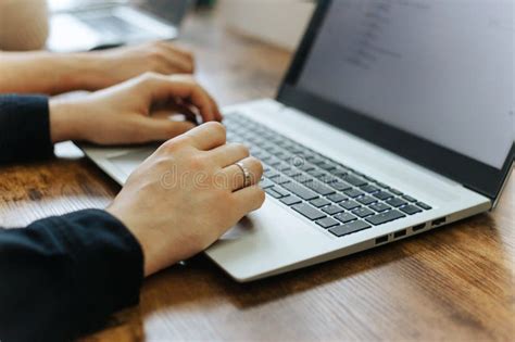 Hands Typing On Laptopand X27s Keyboard In Office Programming Stock