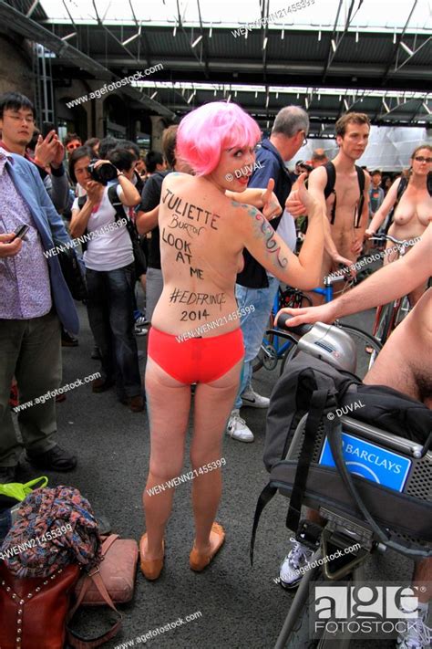 Naked Cyclists Ride Through Central London As A Protest Against Car
