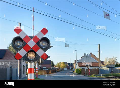 semaphore on railway crossing warning road sign about the proximity of