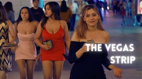 Las Vegas Strip At Night People Watching Featuring Caesars Palace Rock N Roll Marathon 2024