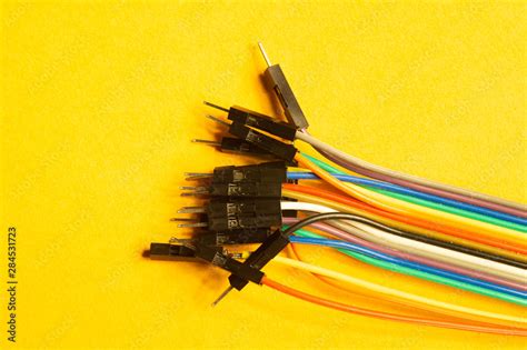 Colorful Wires Isolated On Yellow Background Connection Wire For