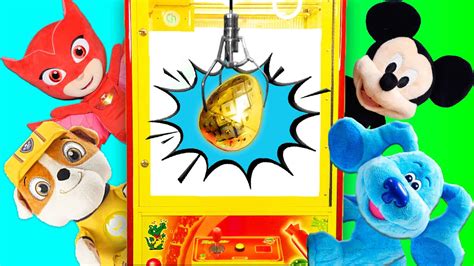 Playing The Claw Machine Surprise Game With Golden Surprise Egg YouTube