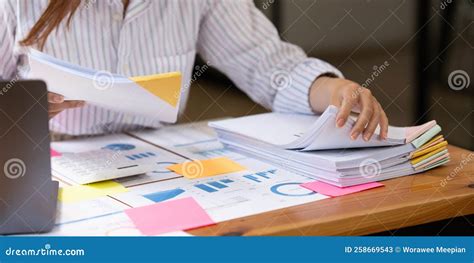 Stack Of Financial Report Paper Documents For Business Desk Business