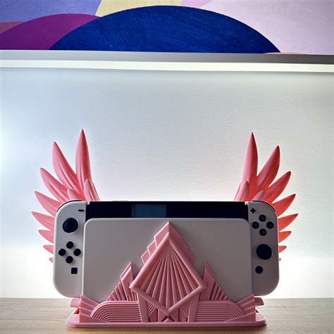 3d Printable Art Deco Wings Nintendo Switch Dock By Holoprops