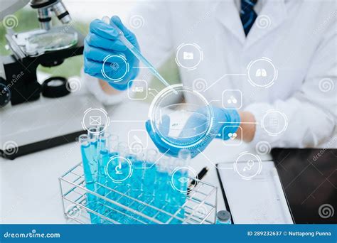 Dna Molecule Testing Concepts The Doctor In A Mask Examines Dna Molecules On The Chemical