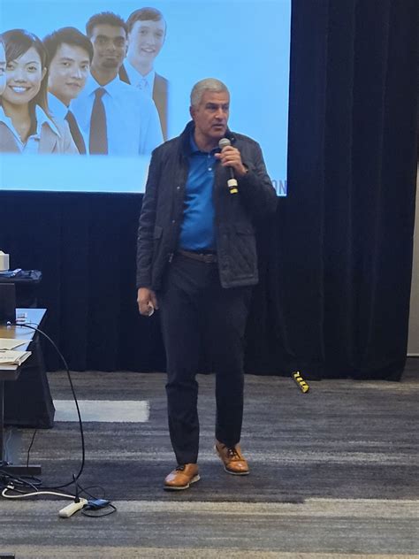 Fernando Assing Ceo Of Centurion Speaking To A Group Of His Global