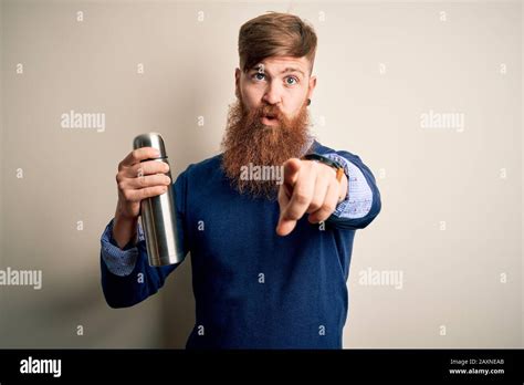 Redhead Irish Man With Beard Holding Takeaway Beverage Thermo Over