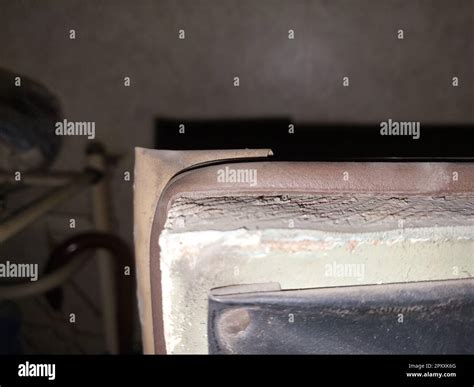 Installing A Door Seal Against Drafts And The Odors Stock Photo Alamy