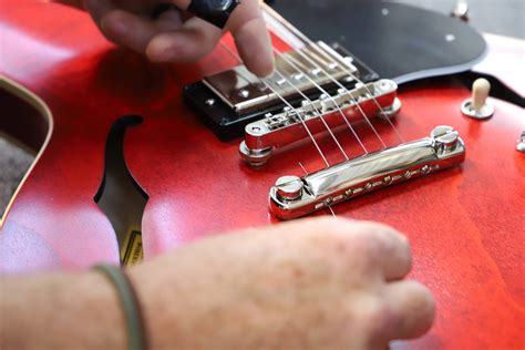 How To Put Strings On An Electric Guitar Audiolover