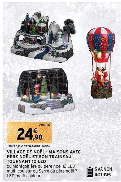 Promo Village De Noël Maison Avec Père Noël Et Son Traîneau Tournant