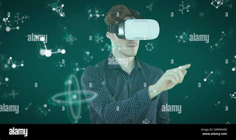 Man In VR Headset Interacts With Floating Molecule Icons Symbolizing