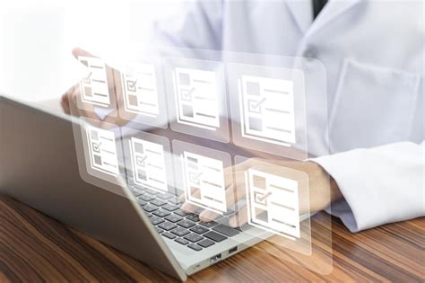 Premium Photo Doctor Using Computer Document Management System Dms