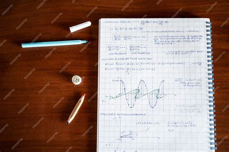 Premium Photo Math Problems Written On The Paper