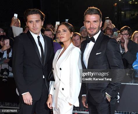 Brooklyn Beckham Victoria Beckham And David Beckham Attend The Gq