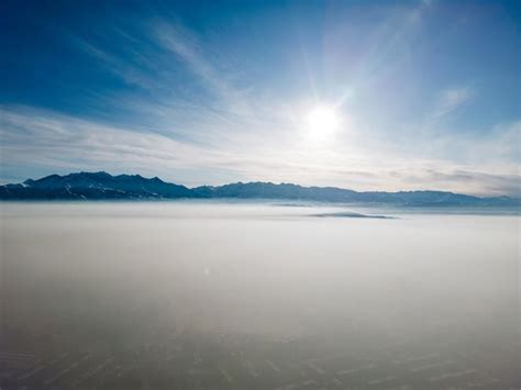 Premium Photo Aerial View Of Polluted City Covered With Smog