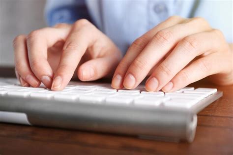 Premium Photo Female Hands Typing On Keyboard Close Up