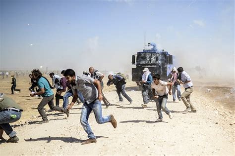 US Launch Air Strikes On Isil As Kurds Flee Syria In Pictures