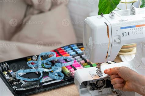Woman Hand Close Up Sews Tulle On Electric Sewing Machine Filling The