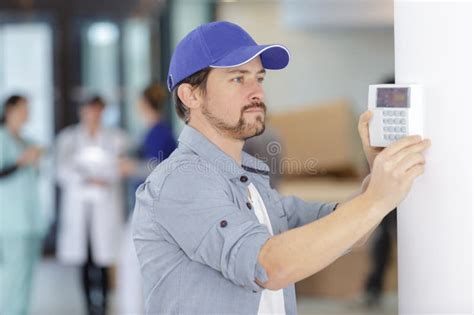 Man Installing Alarm System Indoors Stock Image Image Of Control Alarm