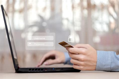 Premium Photo A Businessman Is Typing A Login And Password On The Laptop Keyboard