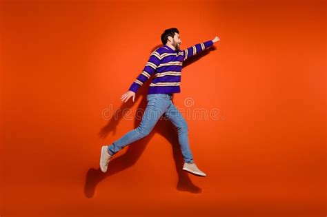 Full Size Photo Of Nice Young Male Flying Superhero Wear Trendy Striped