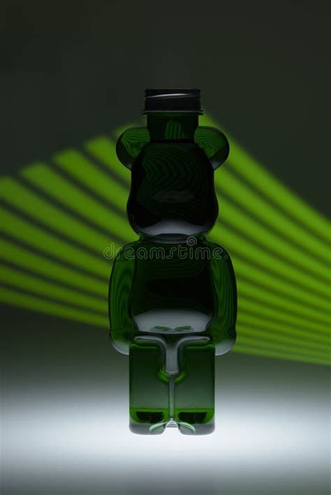 Plastic Teddy Bear Bottle With Food Coloring And Strange Lighting