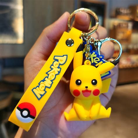 Móc Khóa Pikachu Ngồi Dây Móc Dài 10cm Mô Hình Cao 6cm Nặng