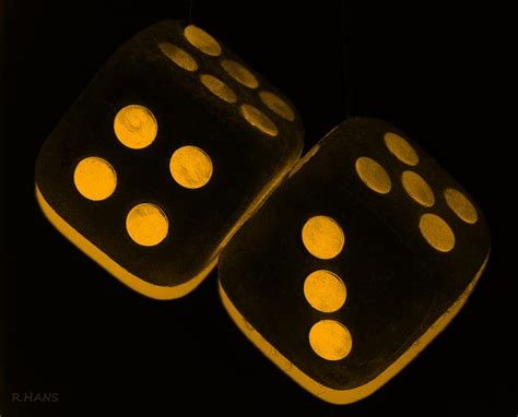 Mamas Fuzzy Dice In Orange Photograph By Rob Hans Pixels