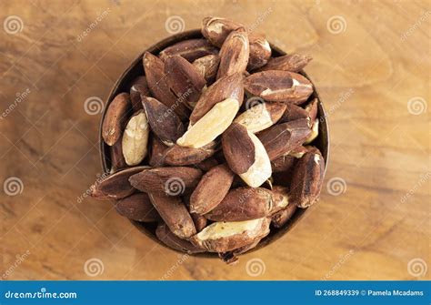 Bowl Of Pili Nuts From The Philippines On A Wooden Table Stock Image