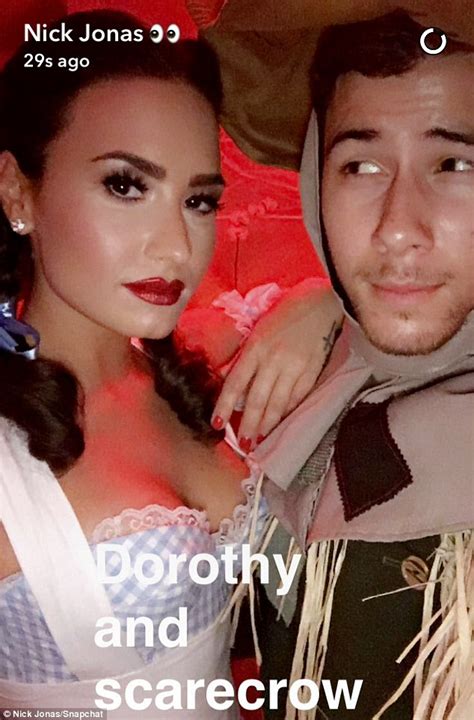 Demi Lovato Dresses Up As A Very Busty Dorothy Gale For Halloween Daily Mail Online