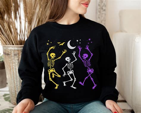 Nonbinary Dancing Skeletons Funny Enby Pride Halloween Sweatshirt