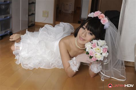 Pretty Japanese Bride Ruri Narumiya Takes Off Her Wedding Dress To Pose