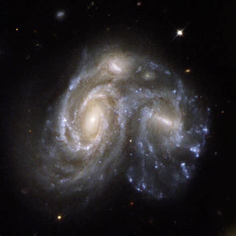Two Spiral Galaxies Colliding