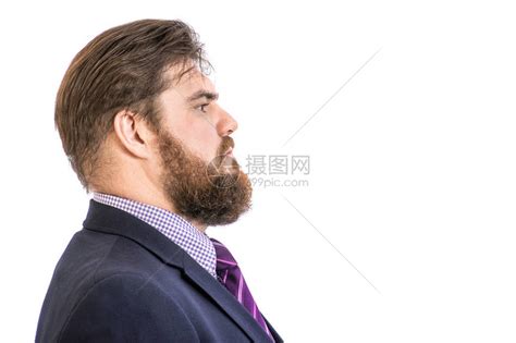 身穿深色西装和一条光亮蓝领带的大英俊严重胡须高清图片下载 正版图片506067085 摄图网