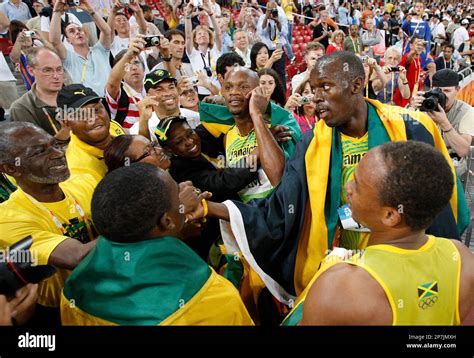 Usain Bolt And His 4x100m Team Stop To Greet Fans After Taking The Gold