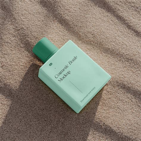 Square Bottle On Beach Free Mockup Free Mockup World