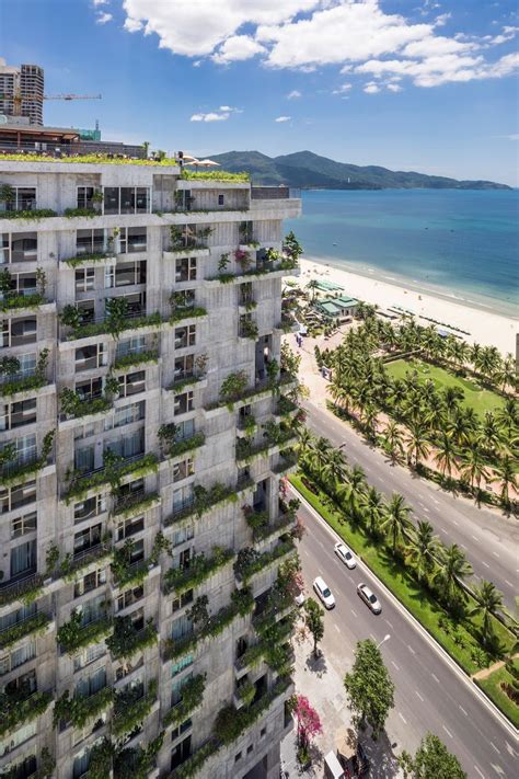 Tropical Plants Cover The Balconies Of Chicland Hotel In Vietnam