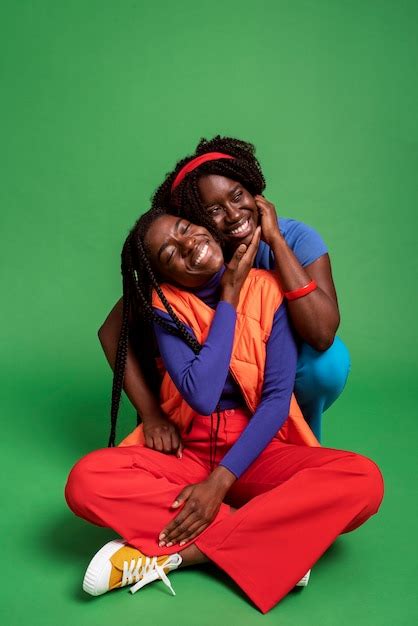 Free Photo Portrait Of Happy Romantic Lesbian Couple Posing Together