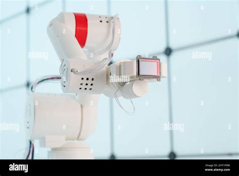 robot arm with ccd and cmos matrix image sensor in the manipulator