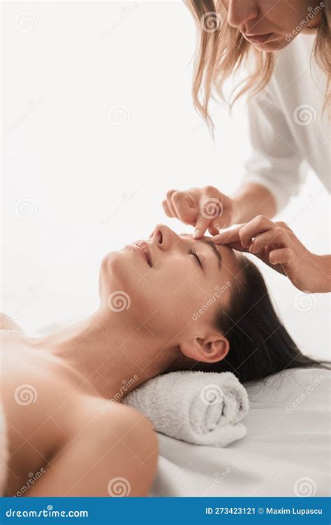 Crop Masseuse Massaging Face Of Client In Spa Salon Stock Image Image